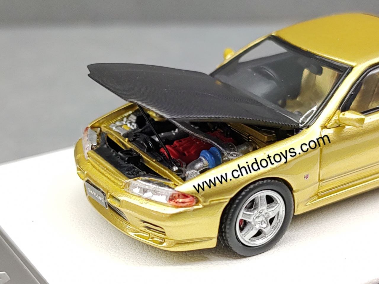 Auto a escala marca Time Micro Modelo Nissan GTR R32 Gold – Chido Toys